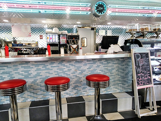 Counter seating: where solo diners become regulars and the coffee refills flow like conversation between old friends.