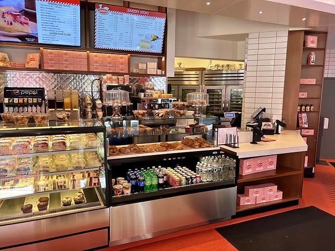 The counter display&mdash;a museum of dessert where every exhibit deserves your undivided attention and unrestrained appetite.