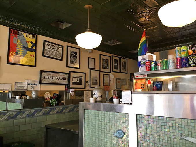 Every inch tells a story of British pride. The wall decorations, including an "Albert Square" sign, celebrate UK culture in this tiny Greenwich Village establishment.