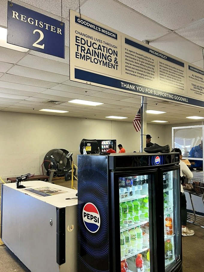 The mission statement proudly displayed above Register 2 reminds shoppers that each purchase supports education, training, and employment programs. Shopping with purpose never felt so good!