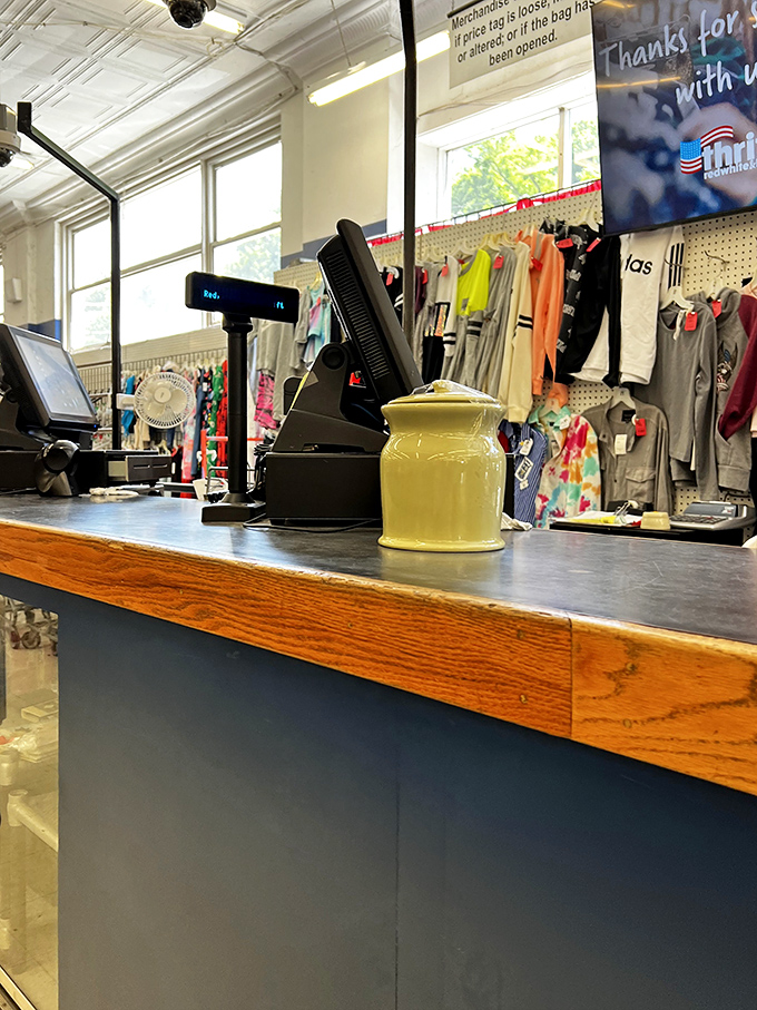 The checkout counter&mdash;the finish line where victorious bargain hunters complete their thrifting marathon with wallets still intact.