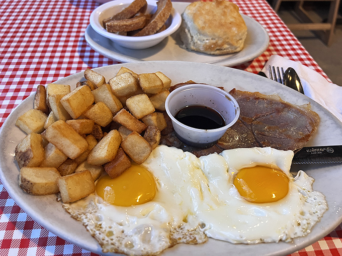 Country ham with sunny-side up eggs that stare back at you saying, "Go ahead, you know you want to break my golden heart."
