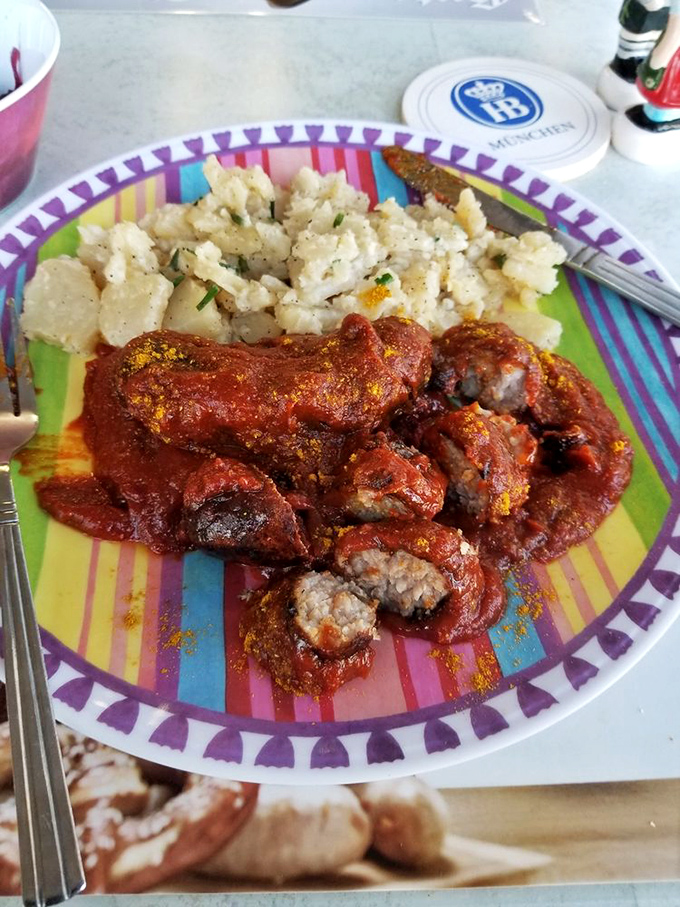 Currywurst with potato salad&mdash;a Berlin street food classic that's found a happy retirement home in Florida. That sauce has stories to tell.