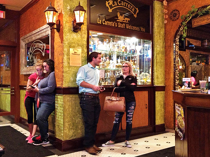 The bar area welcomes patrons with the promise of tequila treasures and conversation &ndash; the ultimate Mexican hospitality.