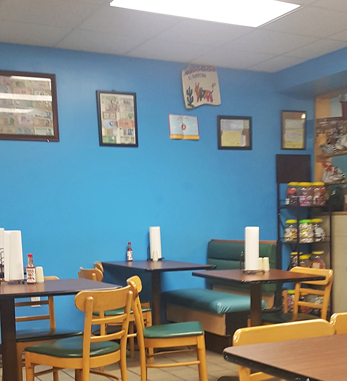 The walls tell stories of pride and heritage through framed mementos, while the simple tables invite you to create your own memories over plates of excellence.