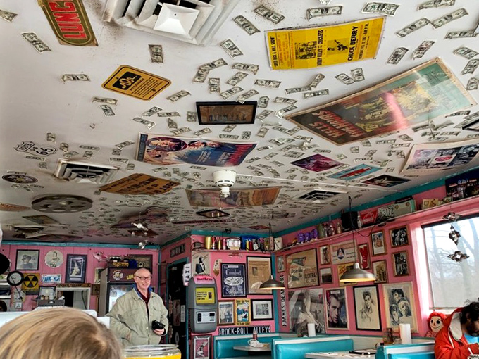 Money and memorabilia plaster the ceiling like a scrapbook gone wild &ndash; each item telling its own story of American pop culture.