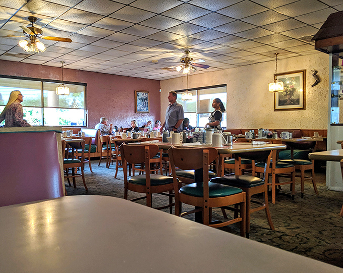 A dining room filled with happy customers, all participating in the sacred morning ritual of breakfast done right.
