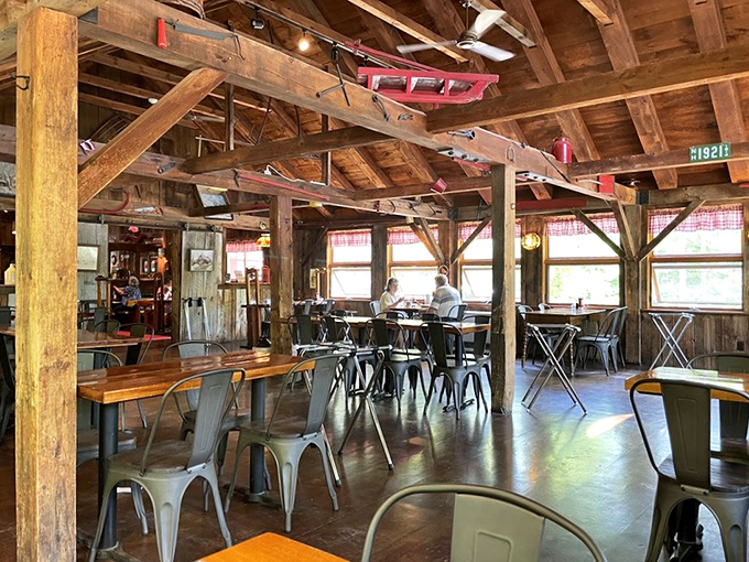 The dining area preserves the barn's original character, where every wooden beam has witnessed countless maple-induced smiles.