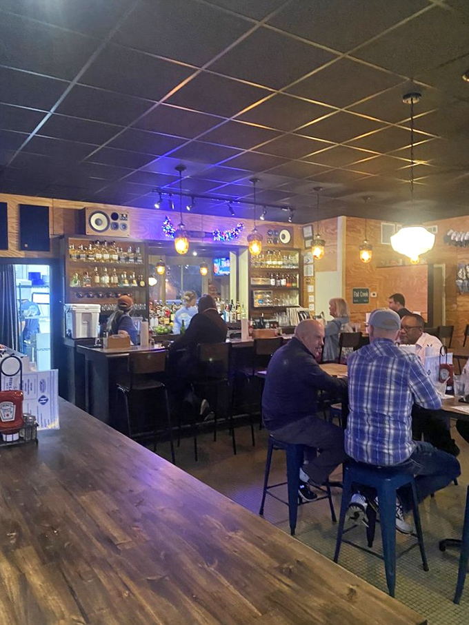Where strangers become friends over shared appreciation of burgers. The blue stools aren't just functional&mdash;they're conversation starters.