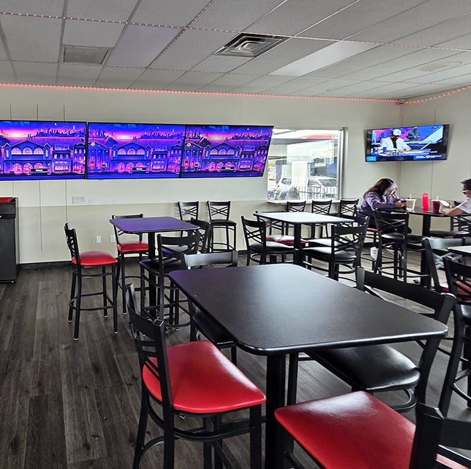 The purple glow of the digital menu board adds a touch of Vegas drama to your taco experience. Dining room by day, taco lounge by night.