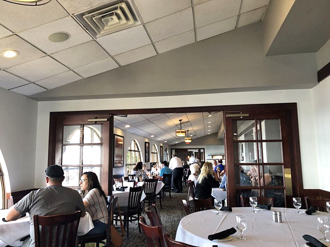 The dining room hums with the symphony of clinking glasses and satisfied conversation—the universal language of good food.