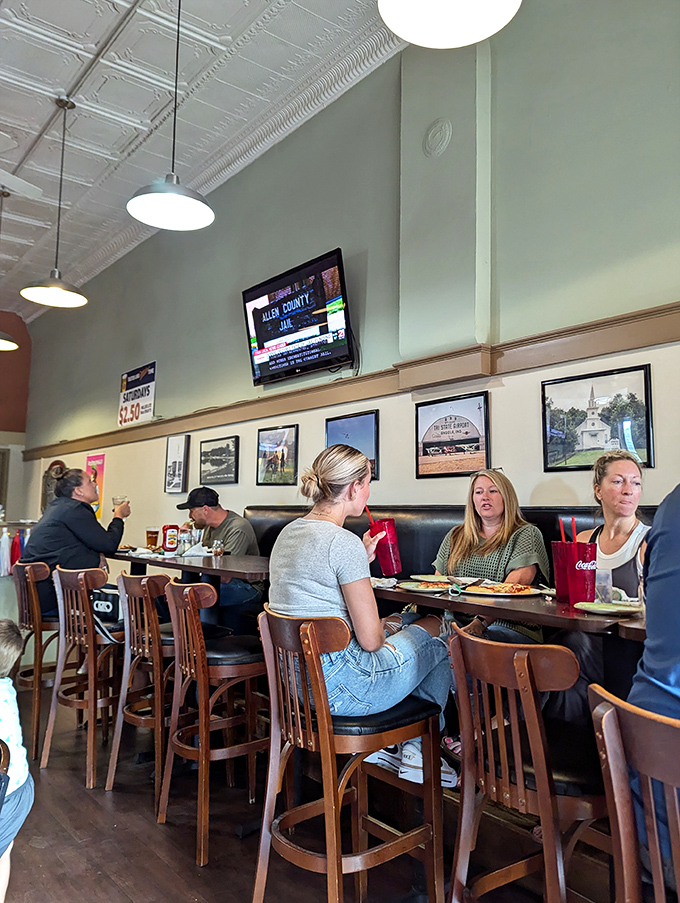 High-top tables create the perfect perch for people-watching while debating the merits of thin versus thick crust &ndash; a conversation as old as time itself
