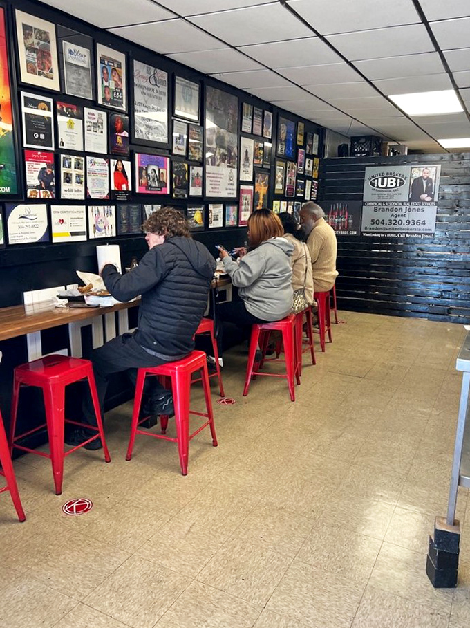 Red stools line the counter where regulars perch like birds on a wire, waiting for their next life-changing meal to arrive.