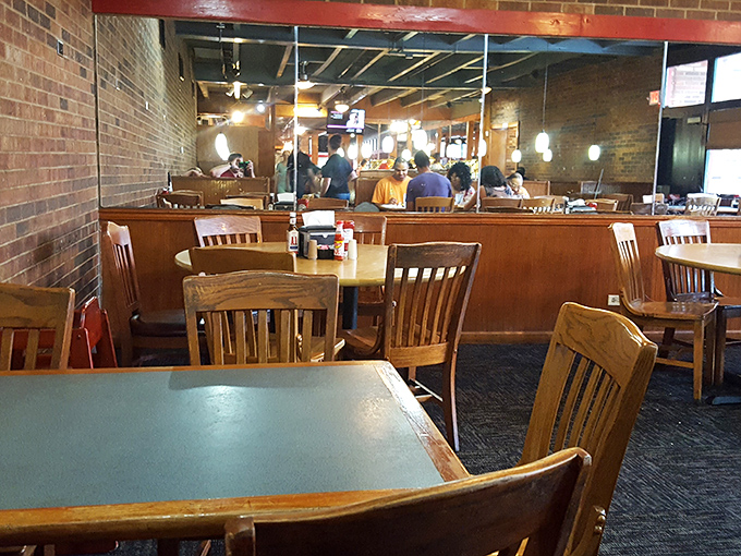 Simple wooden tables and chairs create the perfect stage for the real star of the show&mdash;the food. No distractions, just dining.