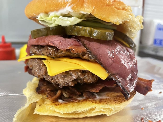 This burger defies both gravity and restraint&mdash;pastrami and bacon creating a meaty masterpiece. 