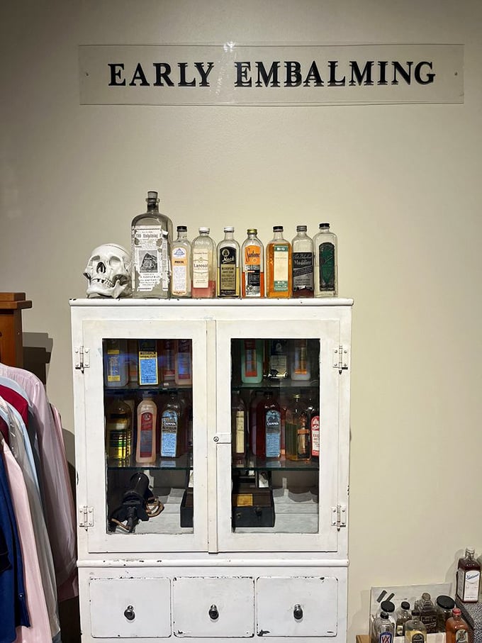 Early embalming chemicals lined up like a bartender's selection&mdash;except these cocktails were definitely not for drinking. The skull adds a nice macabre touch.