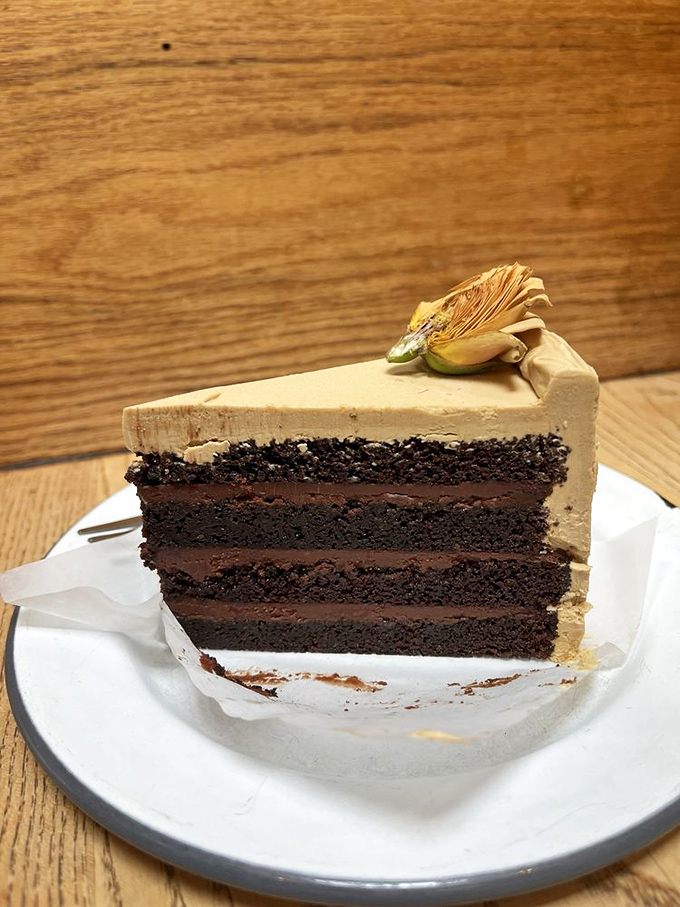 Four layers of chocolate cake that could make a grown person weep tears of pure, unadulterated joy. 