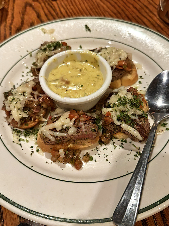 Bruschetta that makes other appetizers jealous. These toasts are wearing their Sunday best with melted cheese and savory toppings.
