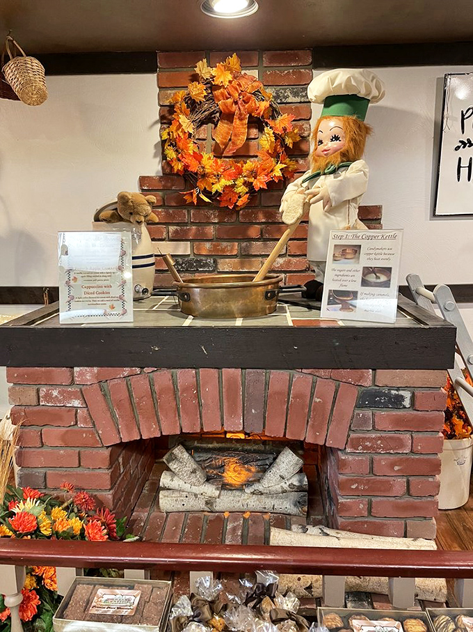 A cozy fireplace display complete with a chef doll that somehow makes you trust their recipes even more.