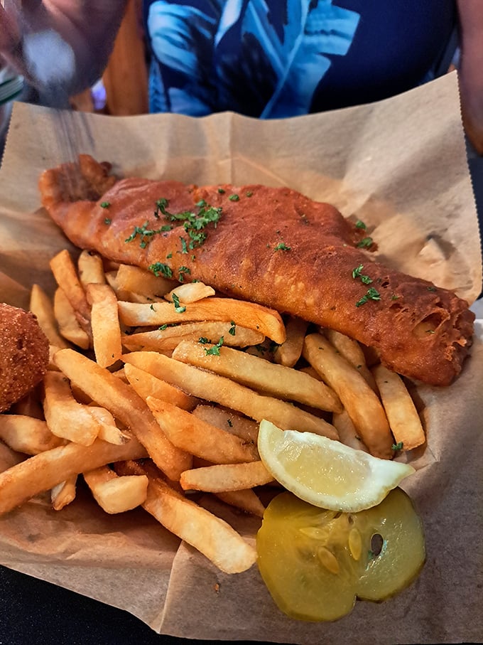 This fish and chips doesn't just satisfy hunger&mdash;it settles the eternal debate of whether seafood tastes better when wrapped in newspaper-lined baskets. (It does.)