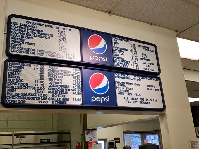 The market's culinary heart. Nothing fuels serious treasure hunting like a perfectly grilled cheese sandwich and an ice-cold Pepsi between aisles.