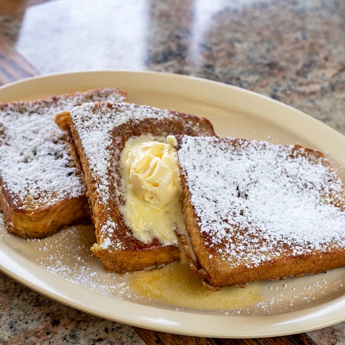 French toast that's actually French in spirit&mdash;indulgent, unapologetically buttery, and dusted with powdered sugar like a Parisian snowfall. 