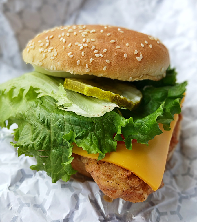 A chicken sandwich that makes those fast-food chicken wars seem pointless. The real champion has been quietly serving in Athens all along.