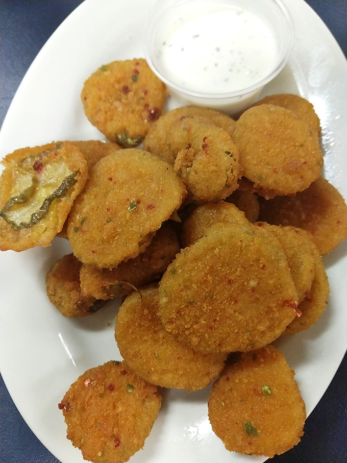 Fried pickles&mdash;crispy, tangy perfection that makes you wonder why anyone bothers with fancy appetizers. The ranch dipping sauce is non-negotiable.