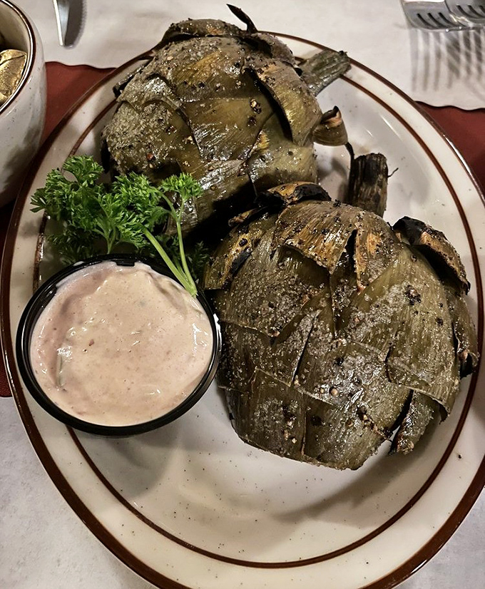 Grilled artichokes that have achieved what we're all seeking&mdash;transformation through fire into their best possible selves, dipping sauce included.