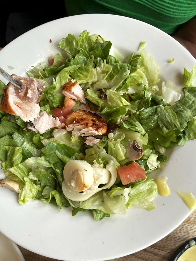 A salad that doesn't feel like punishment &ndash; fresh greens, grilled chicken, and enough goodies to make you forget you're eating something healthy.