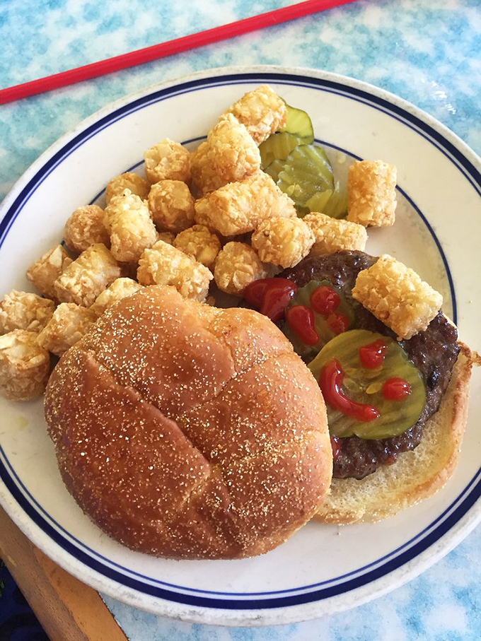 This burger with tots isn't trying to be Instagram famous&mdash;it's too busy being delicious in real life.