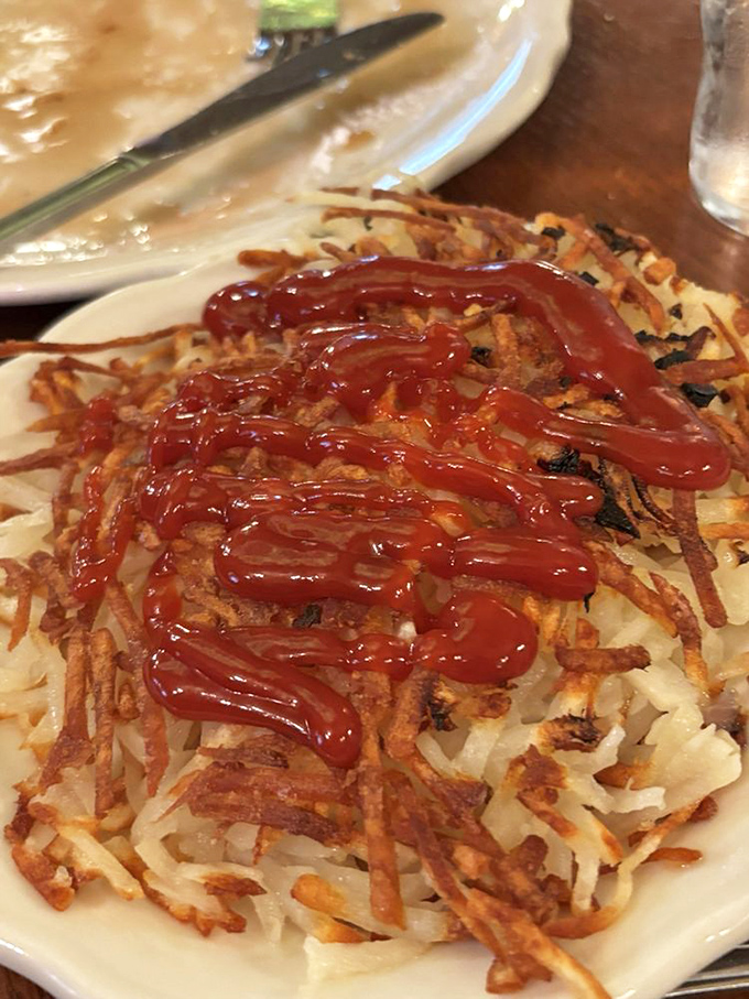 Hashbrowns with a squiggle of ketchup &ndash; simple, crispy potato perfection that proves sometimes the best supporting actors steal the show.