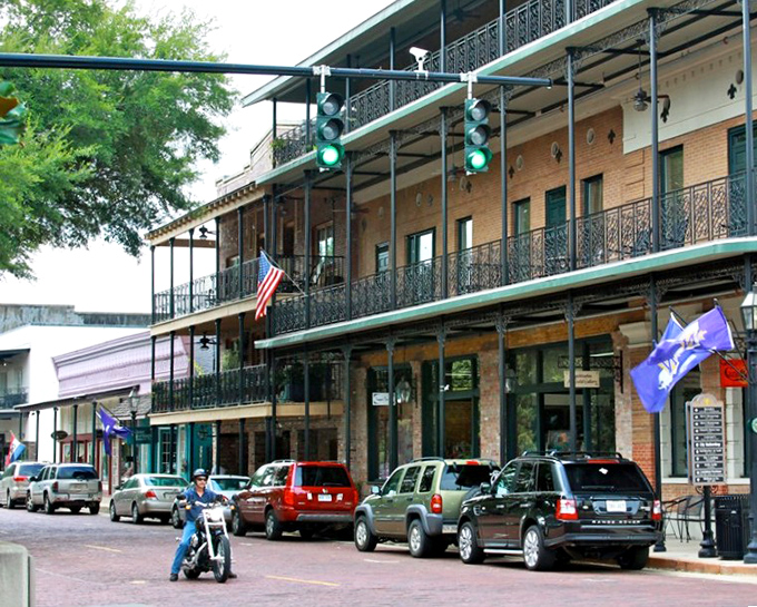 Three stories of history with iron balconies perfect for people-watching&mdash;the true sport of historic districts everywhere.