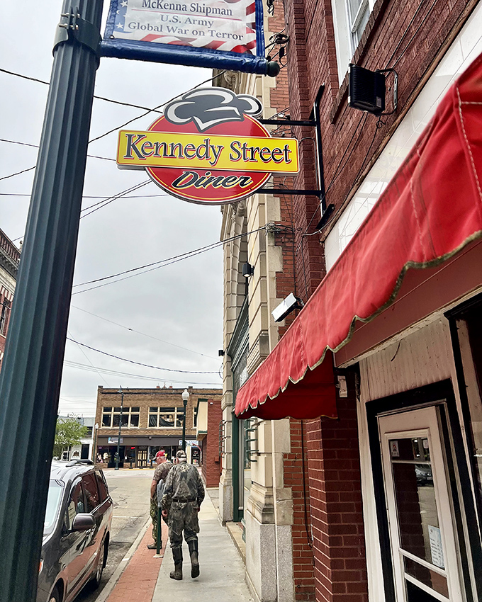 The Kennedy Street Diner sign promises comfort food in a classic setting, where breakfast specials come with a side of local conversation.