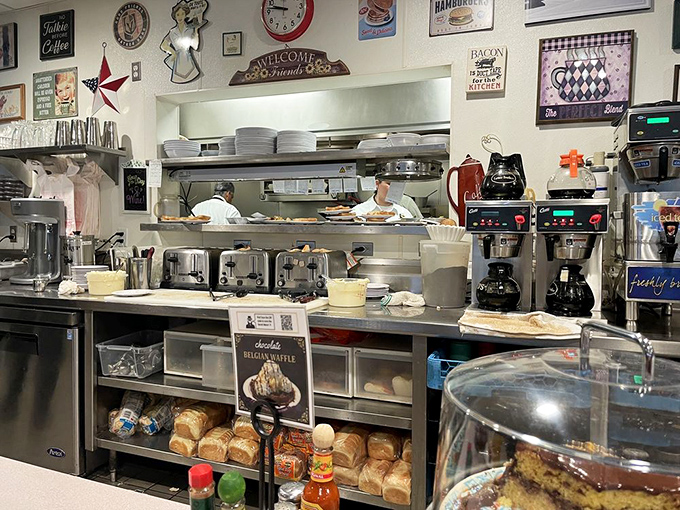 Where the magic happens &ndash; Lou's kitchen area bustling with efficiency, coffee brewing, and comfort food dreams coming true.