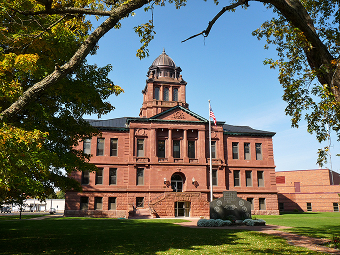 The county courthouse stands as red-bricked authority &ndash; impressively governmental without being intimidating, like a stern but fair grandfather.