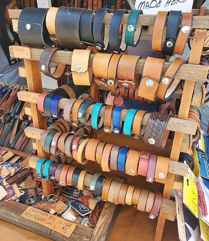 Leather craftsmanship on display, where belts become wearable art and the phrase "they don't make 'em like they used to" meets its match.