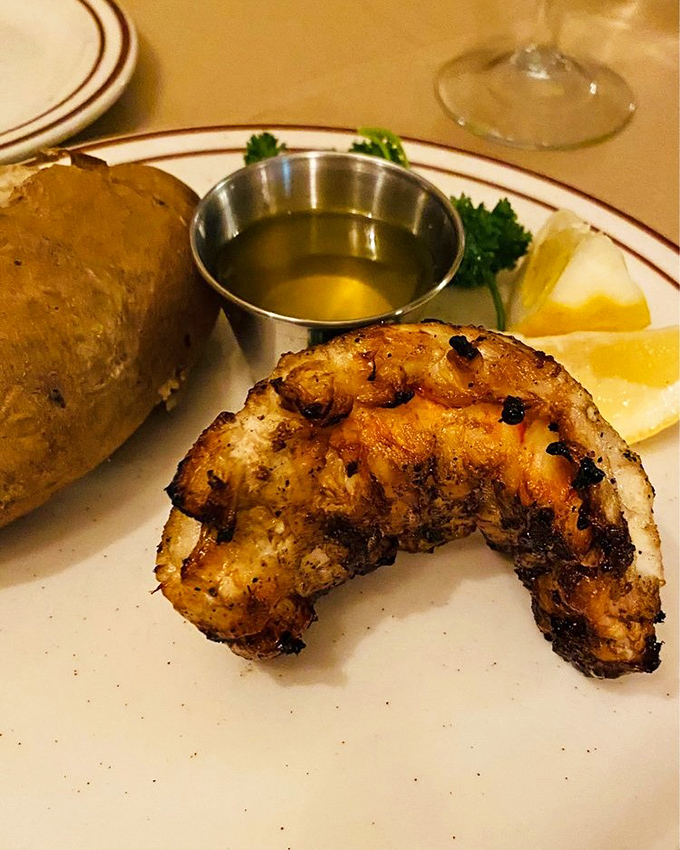 This lobster tail didn't sacrifice itself in vain. The grill marks are like medals of honor in the delicious battle of flame versus sea.