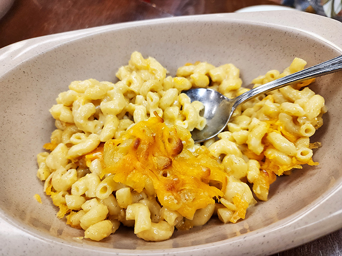 Mac and cheese with those coveted crispy edges that everyone fights over&mdash;comfort food that makes you feel like a kid again with every creamy, cheesy bite.