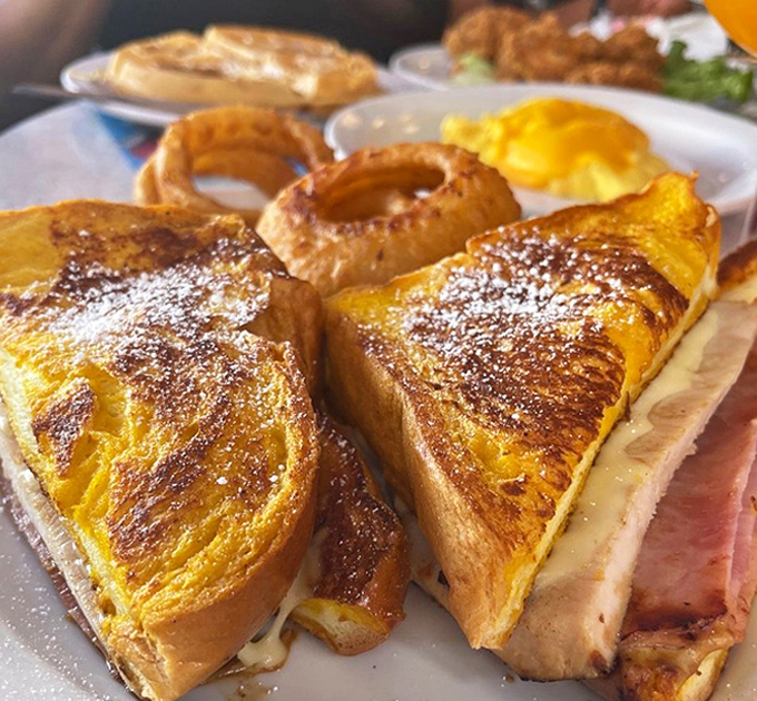 French toast that's achieved golden perfection, with eggs and bacon on standby for when your sweet tooth needs a savory intervention.