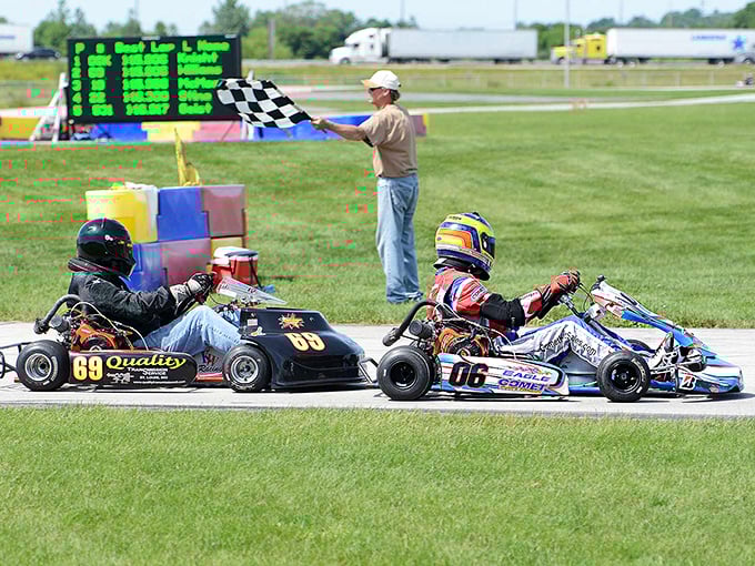 Speed demons of all ages can satisfy their racing urges at New Castle Motorsports Park, where checkered flags wave without checkered bank accounts.