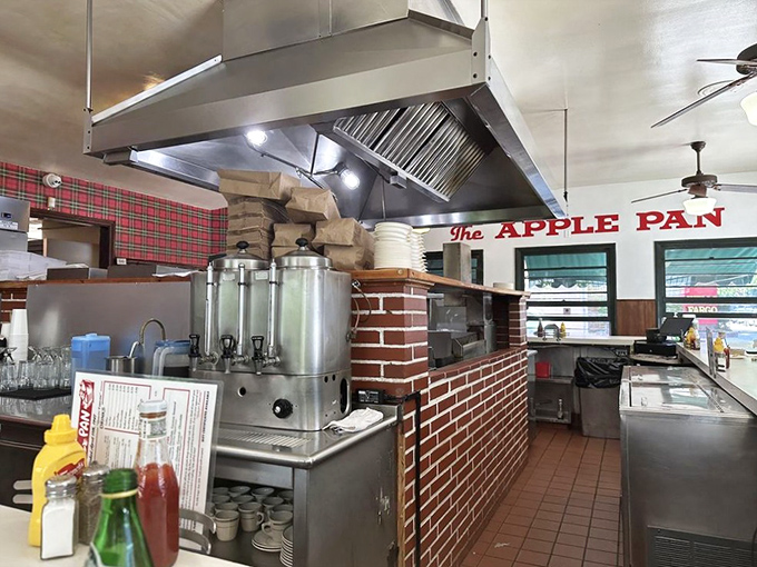 The open kitchen design means you can watch your burger's journey from raw patty to transcendent experience &ndash; dinner and a show!