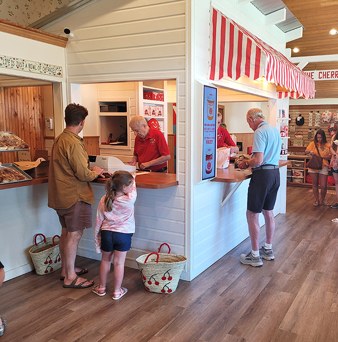 The order counter—where cherry dreams become reality. Those baskets aren't just decorative; they're for carrying pies home. Think ahead, my friends.