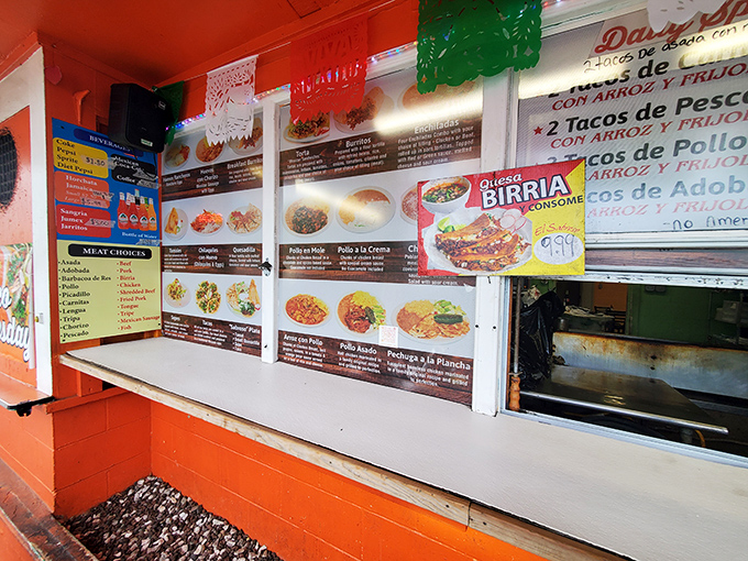 The ordering window&mdash;where dreams come true and decisions get difficult. The colorful menu boards showcase possibilities that will haunt your food fantasies.