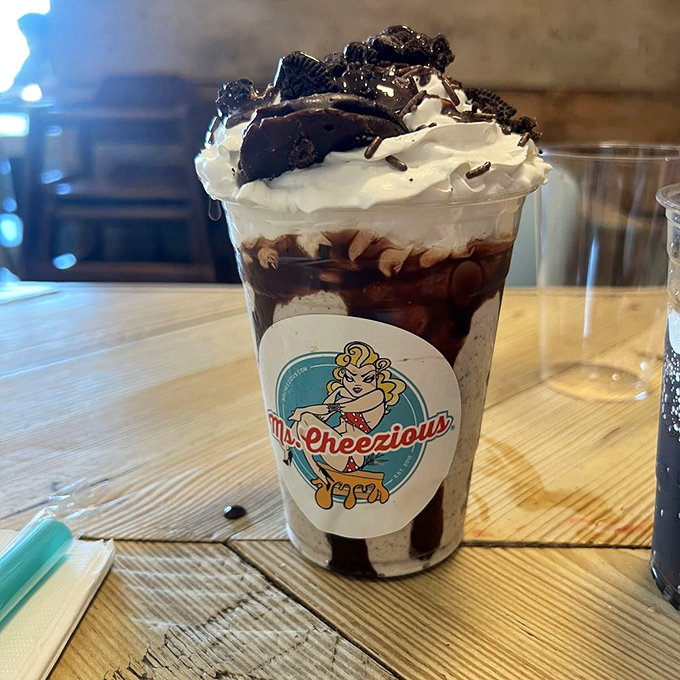 This Oreo milkshake isn't just a drink &ndash; it's a dessert skyscraper with whipped cream penthouses and cookie condominiums.