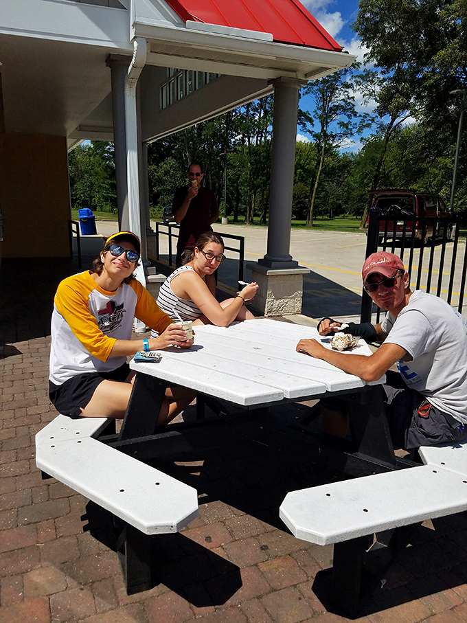 The outdoor picnic tables—where strangers become friends united by the brotherhood of exceptional frozen custard.
