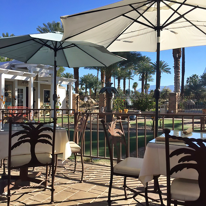 The view from your table includes swaying palms and desert mountains. Nature's dining room might just improve the taste of everything.