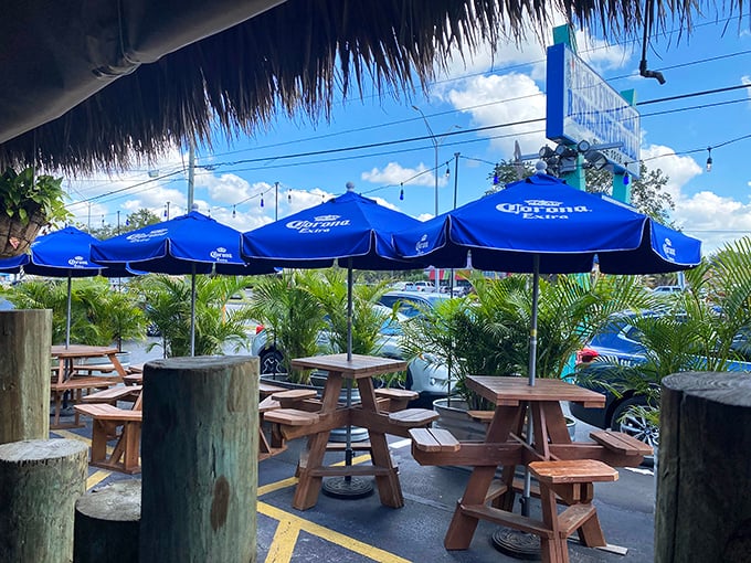 Blue umbrellas create islands of shade in the outdoor seating area&mdash;perfect for those "I could sit here all afternoon" moments.