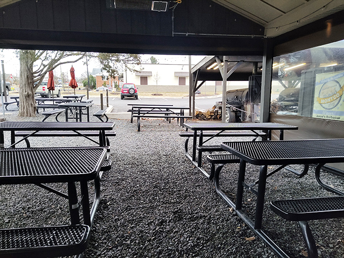 The outdoor dining area where barbecue memories are made. These picnic tables have witnessed more food euphoria than a cooking show highlight reel.
