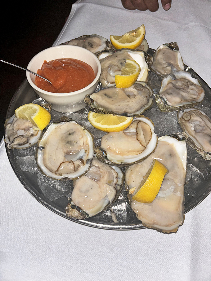 These oysters aren't just seafood&mdash;they're briny jewels from the ocean, served with lemon crowns and a cocktail sauce that means business.